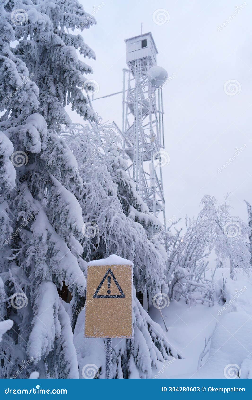 Yellow Warning Sign in Front of a Frozen Watchtower Stock Image - Image ...