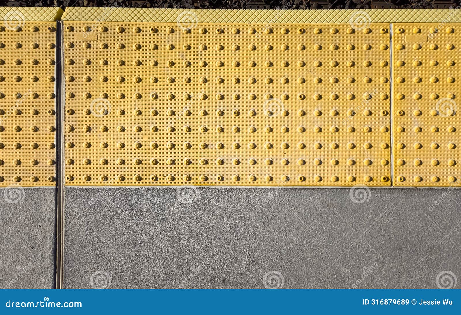Yellow Warning Tile Bumps in Front of Train Tracks Stock Image - Image ...