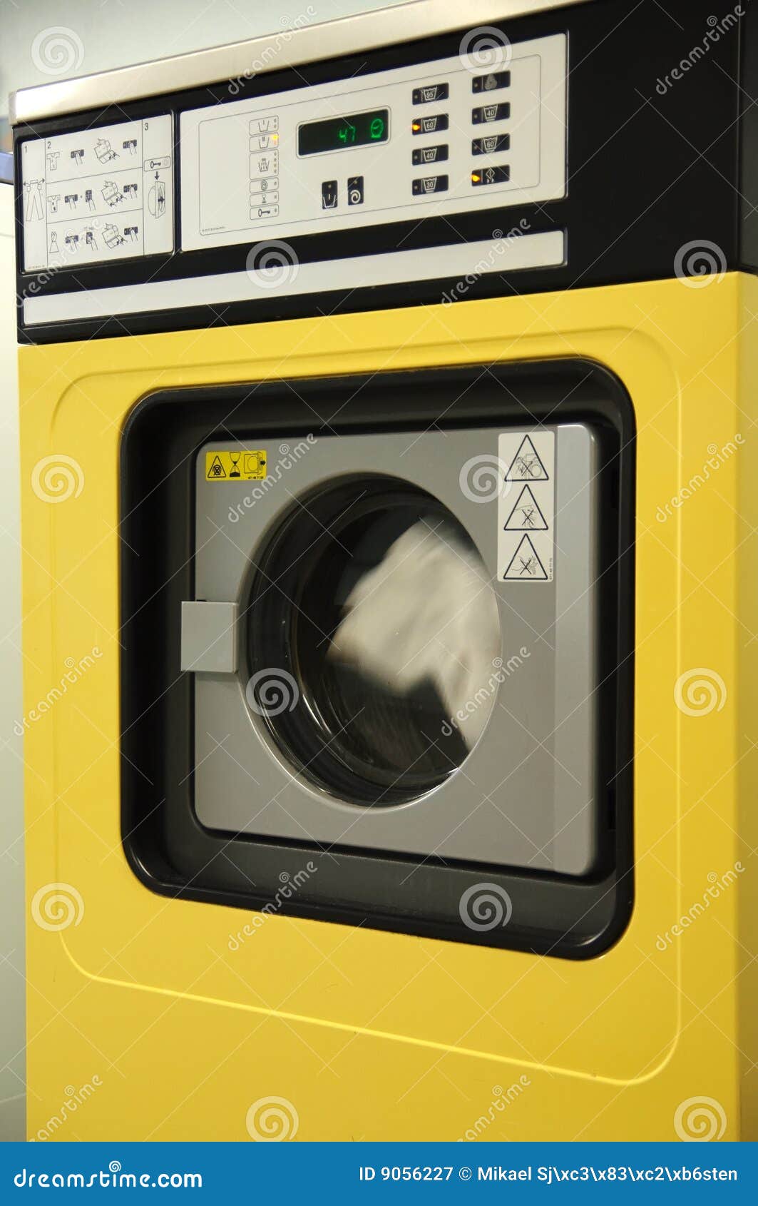 Yellow washing machine stock image. Image of launderette - 9056227
