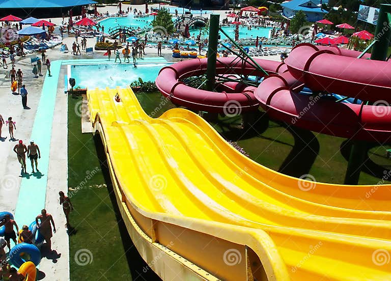 Yellow Water Slide stock photo. Image of summertime, swimming - 5204460