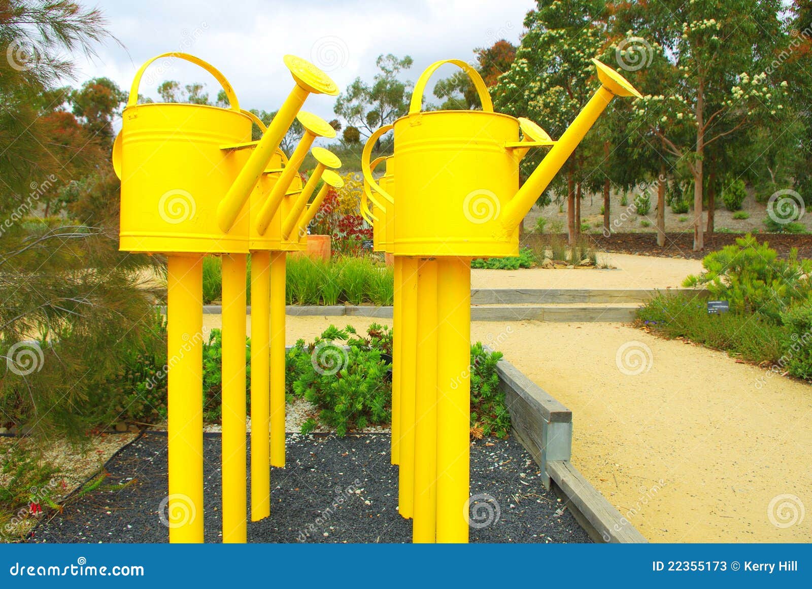 Yellow Watering Cans Display Stock Image - Image of care, summer: 22355173