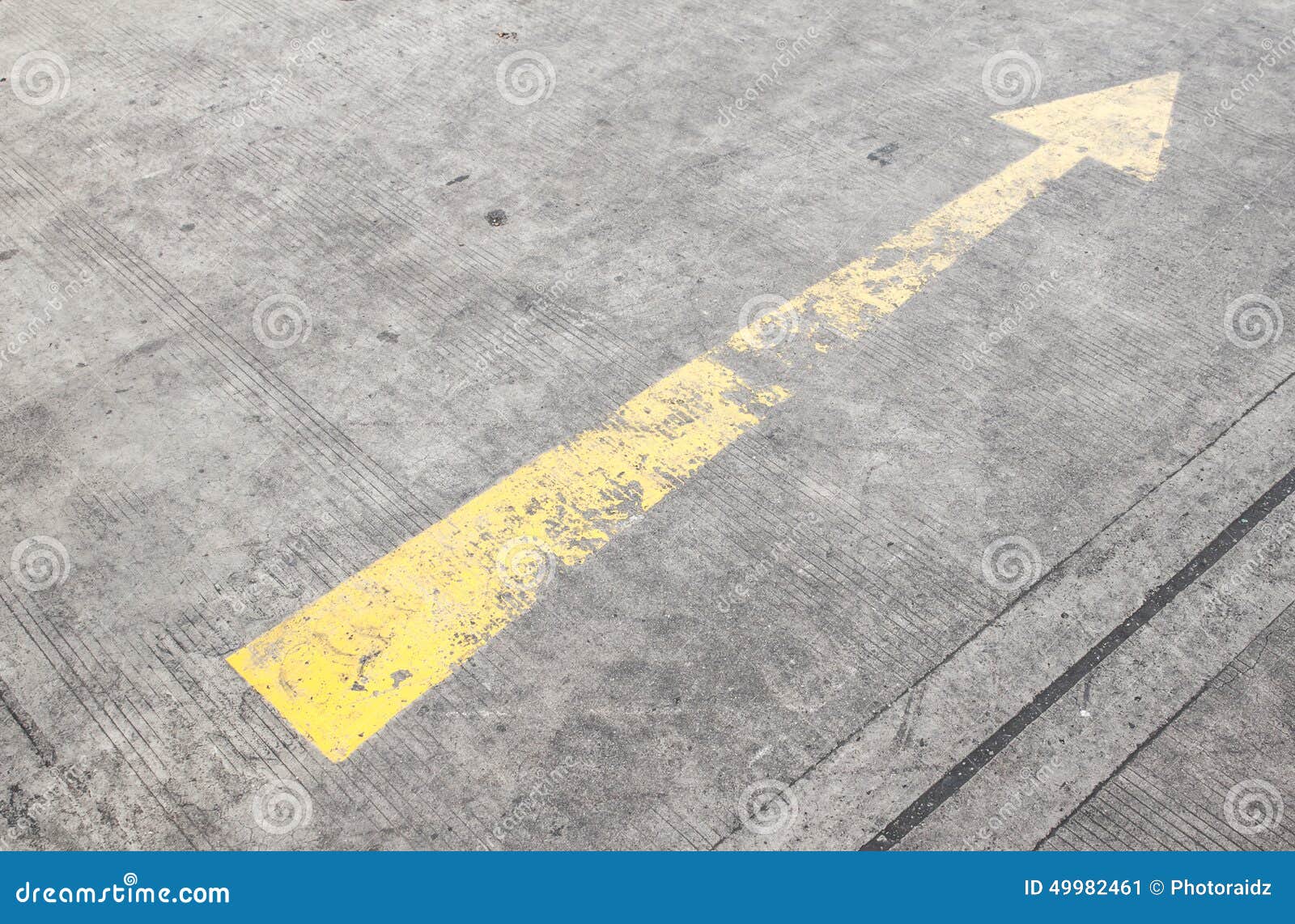 Yellow Way Arrow Pointing Symbol on a Ground Road Surface Stock Image ...
