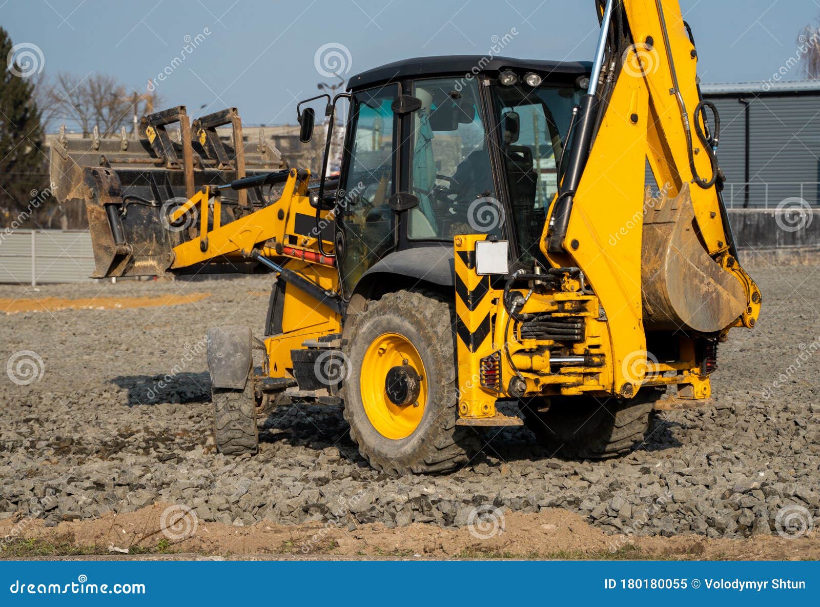 Yellow Wheel Loader Excavator Machine Working at Construction Site with ...