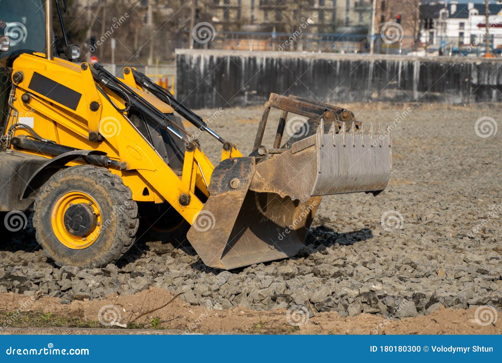 Yellow Wheel Loader Excavator Machine Working at Construction Site with ...