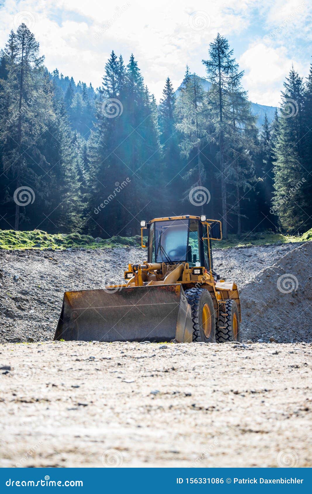 Yellow Wheel Loader Excavator in a Quarry Stock Photo - Image of ...