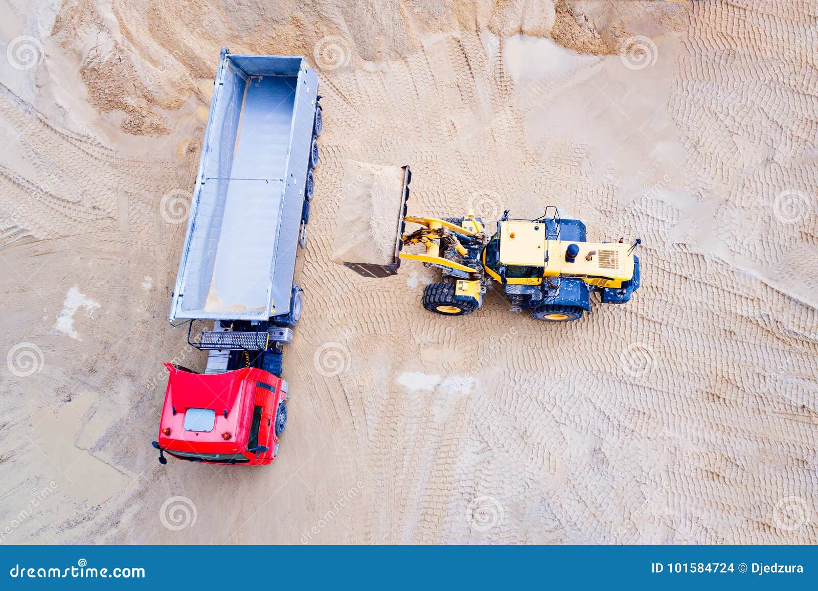 Yellow Wheel Loader Loading Sand on Dumper Truck Stock Photo - Image of ... Yellow Wheel Loader Loading Sand on Dumper Truck Stock Photo - Image of ...