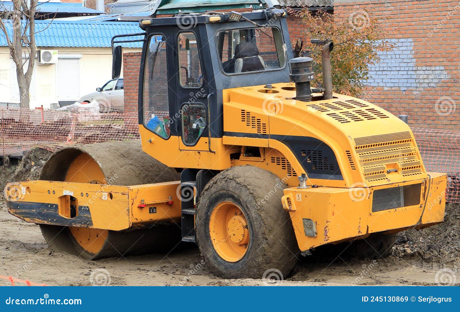 Yellow wheel roller. stock image. Image of rammer, roller - 245130869