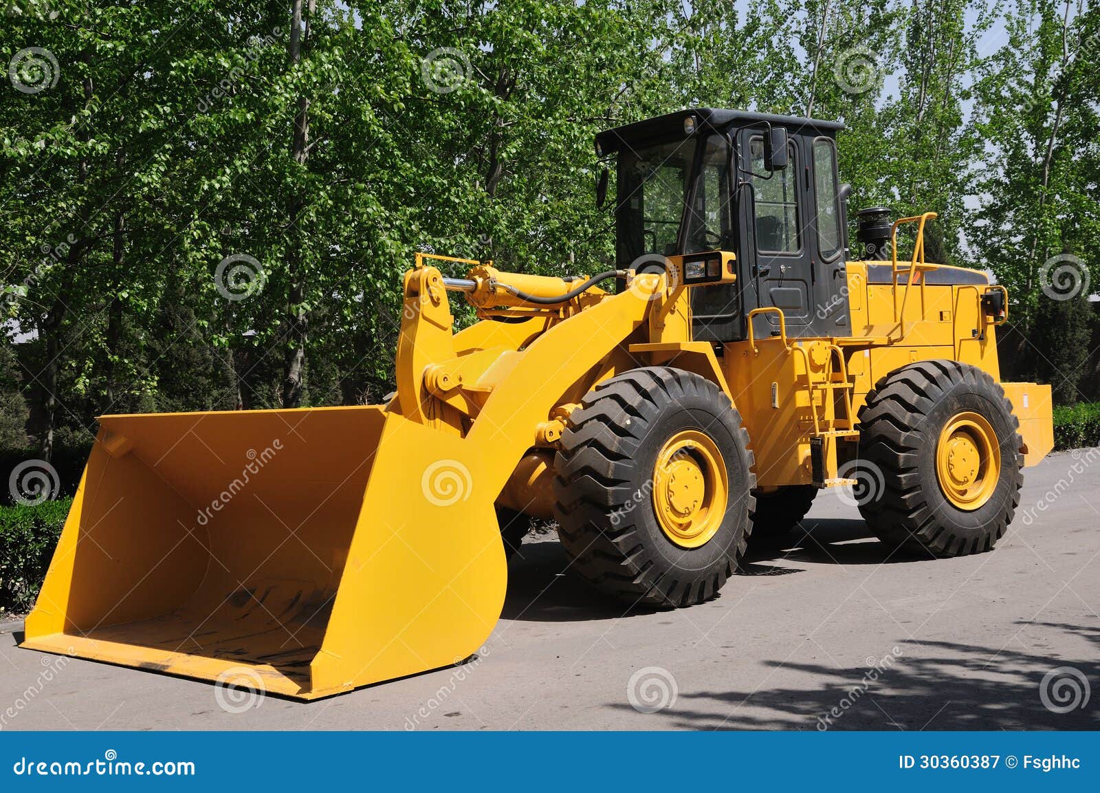 Yellow wheeled loader stock image. Image of heavy, stop - 30360387