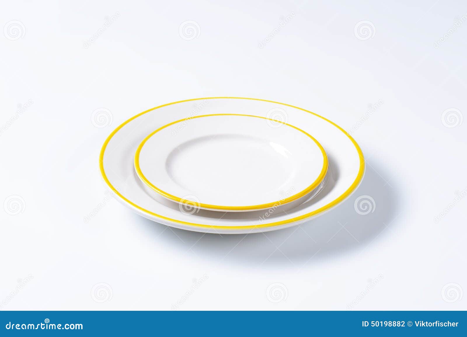 Yellow and White Dinner Plates Stock Photo - Image of smooth, studio ...