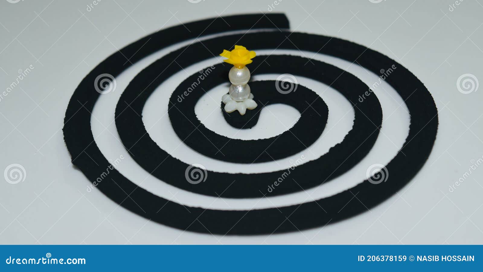 Yellow and White Plastic Objects on Black Surface Stock Image - Image ...