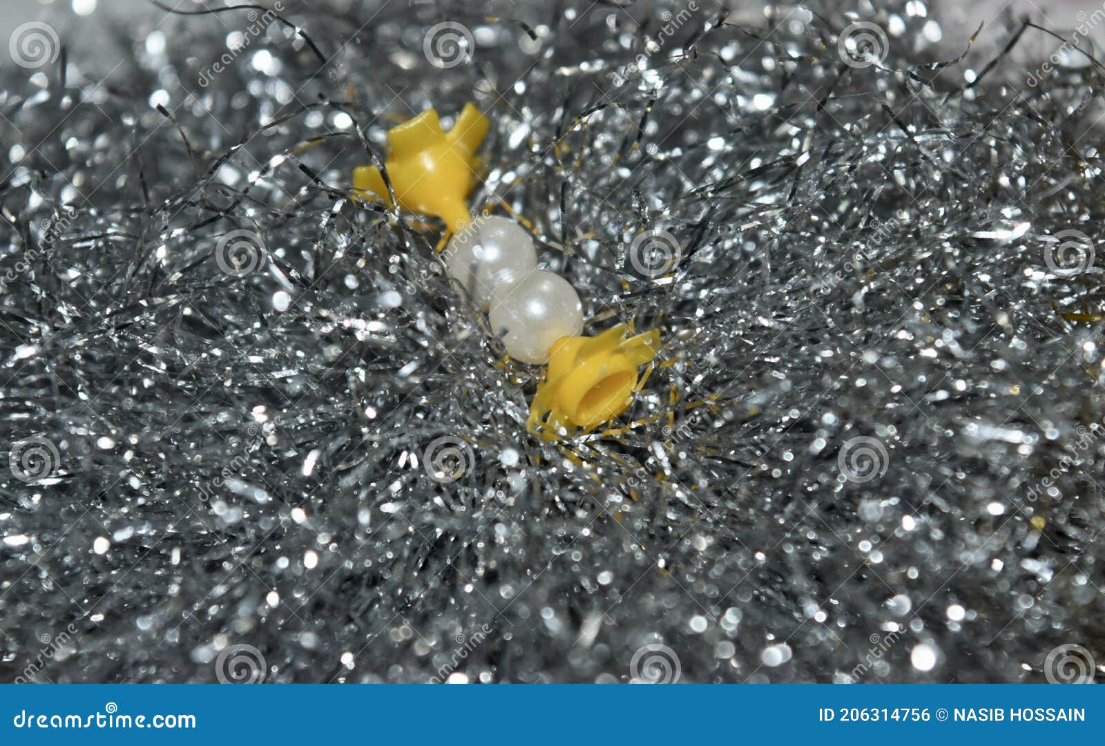 Yellow and White Plastic Objects on a Shiny Papers Stock Photo - Image ...