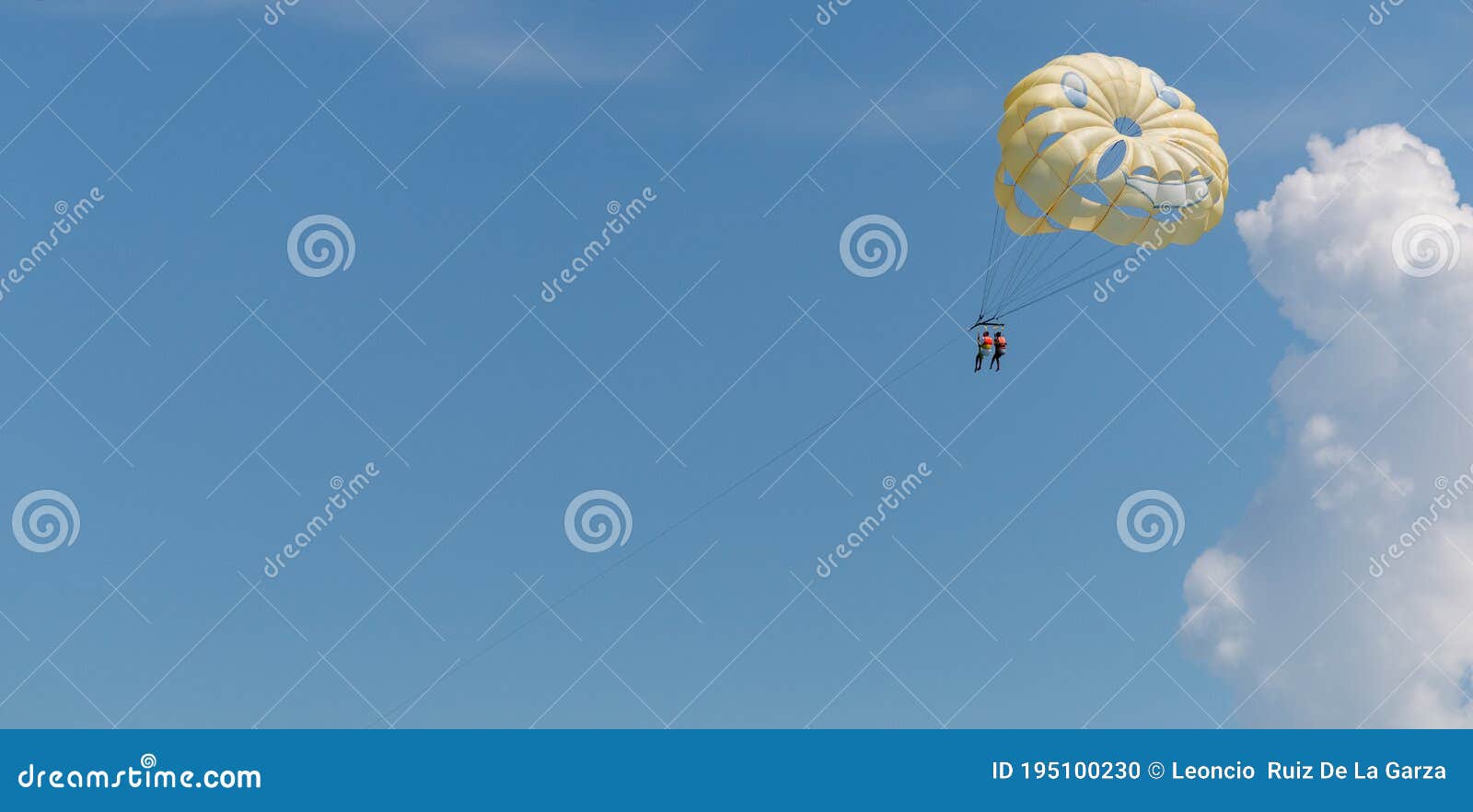 Yellow Wing with Happy Face from Skydiving Pulled by a Boat. Summer ...