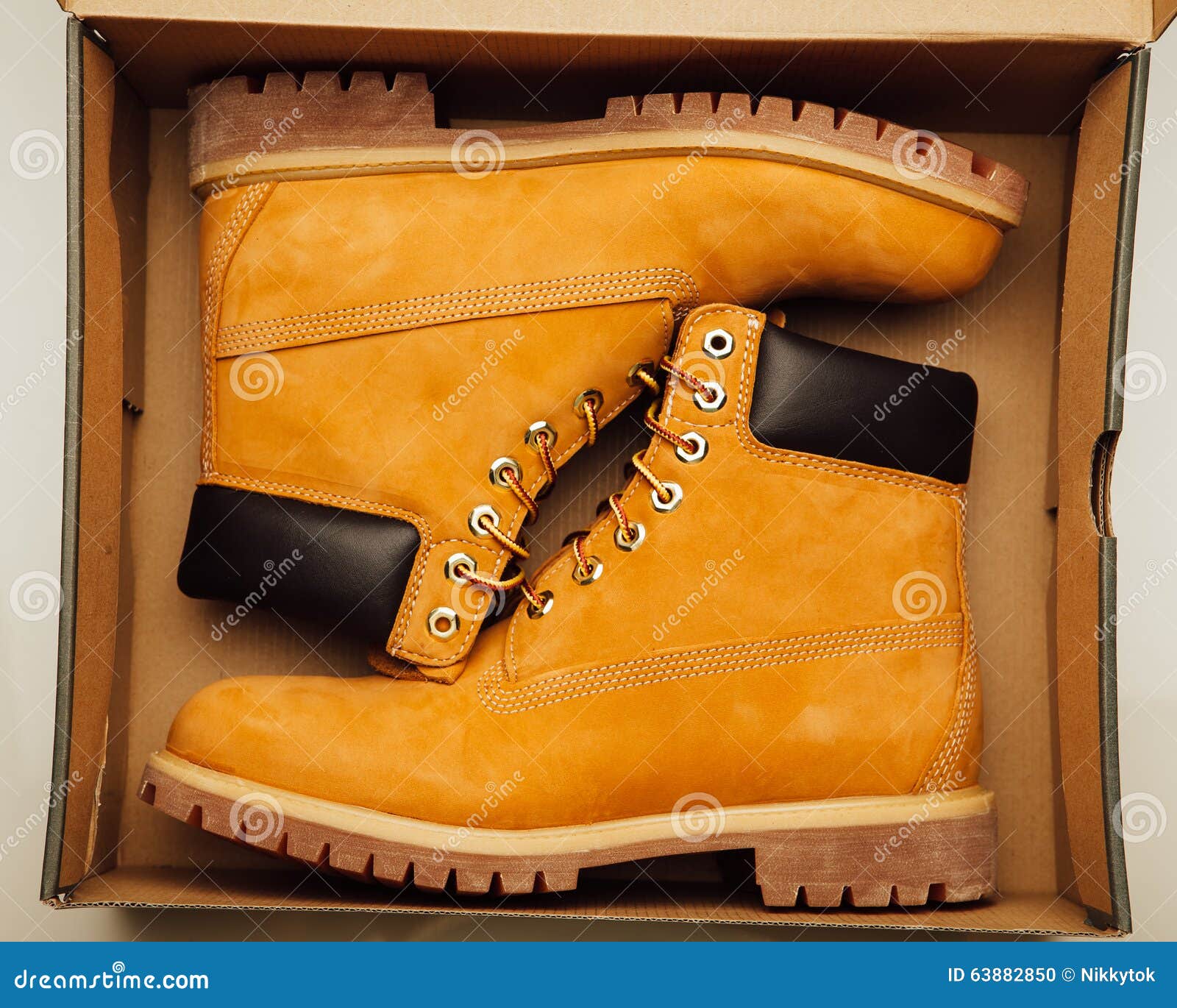 Yellow Winter Boots in the Box Stock Photo - Image of aesthetic, male ...