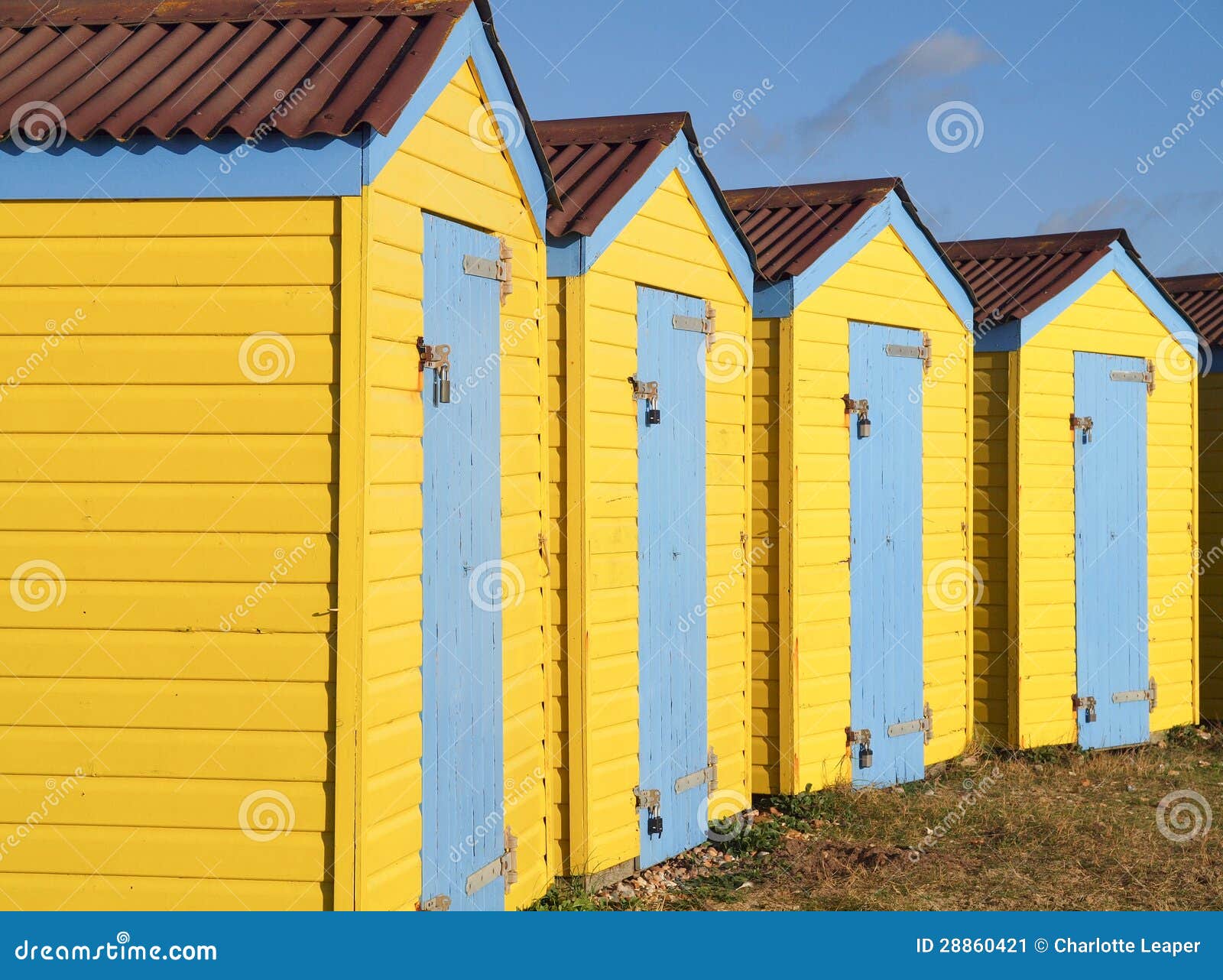 Yellow Wooden Beach Huts stock image. Image of bright - 28860421