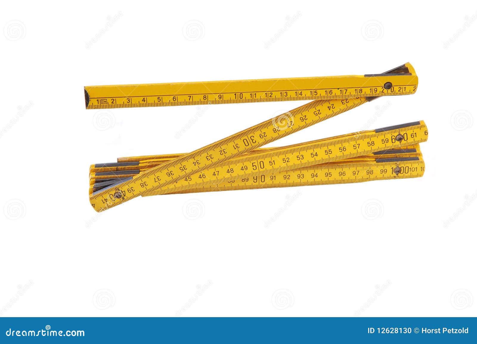 Yellow wooden ruler. stock photo. Image of construct - 12628130
