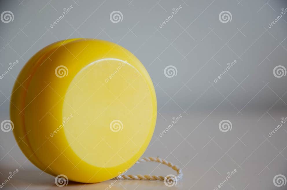 Yellow Yo-Yo stock photo. Image of string, childs, play - 50255980