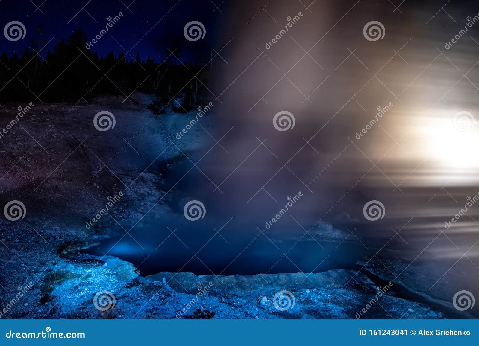 Yellowstone Geysers Erupting at Night Illuminated by Light Stock Image ...