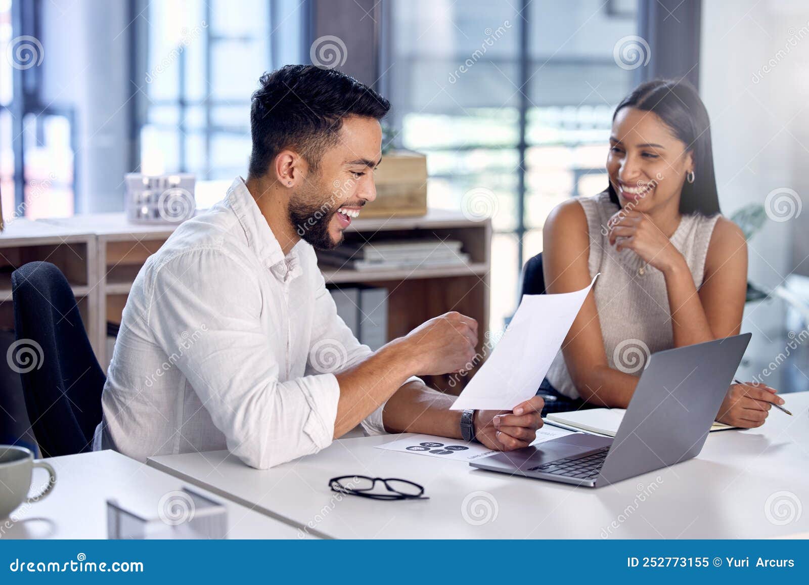 Yes that the Strategy we Should Use. Two Work Colleagues Reading Over ...