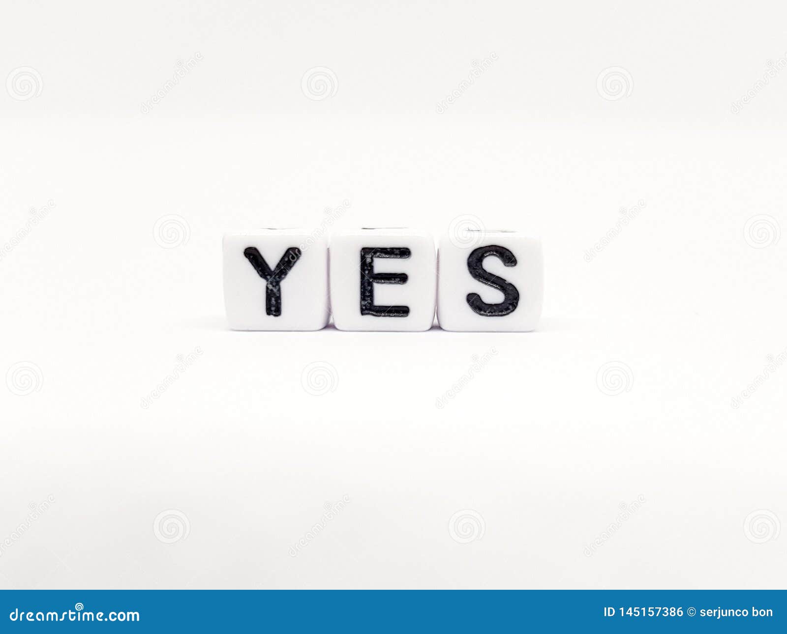 Yes Word Built with White Cubes and Black Letters on White Background ...