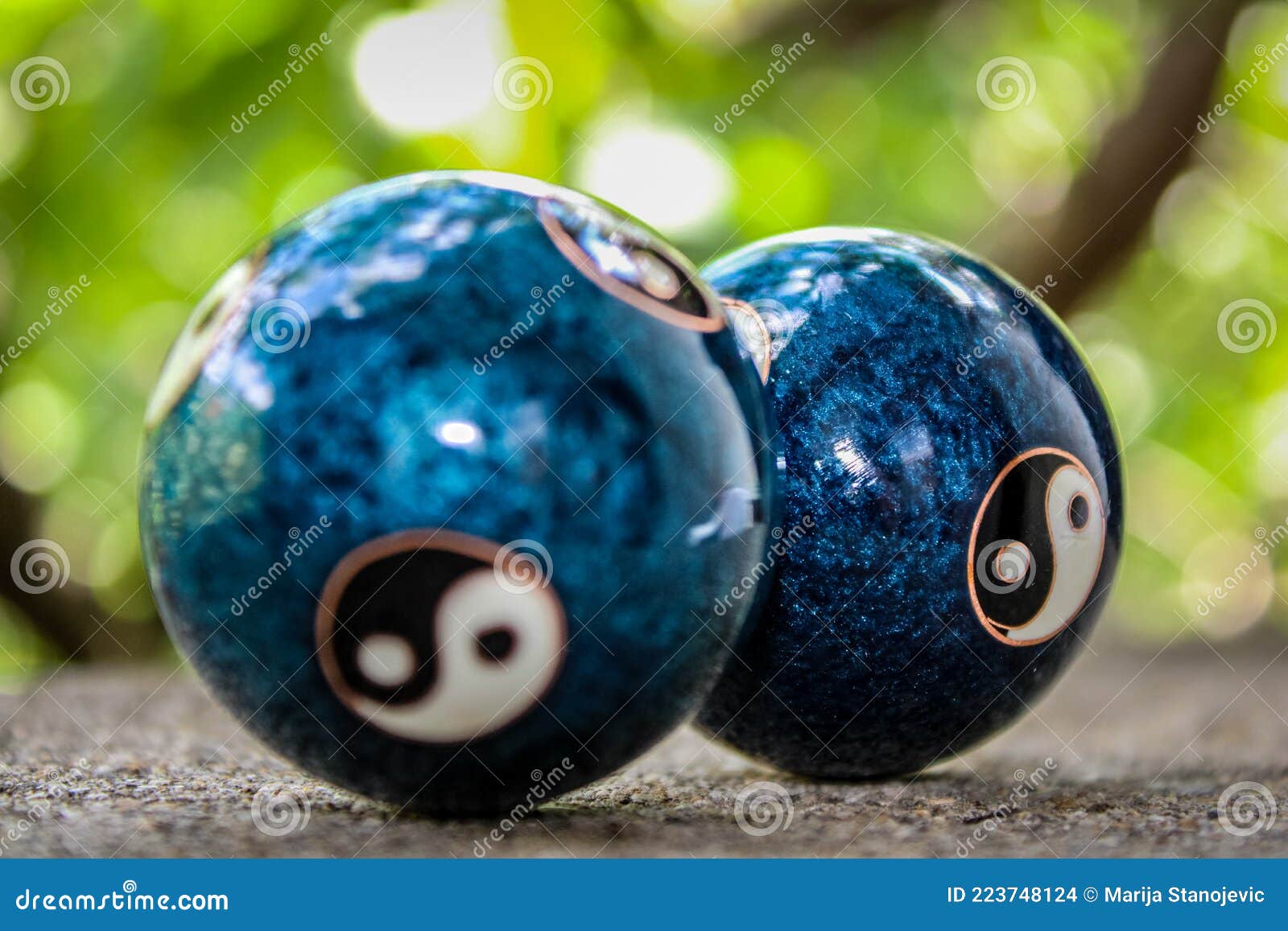 Yin and Yang Chinese balls stock photo. Image of iron - 223748124