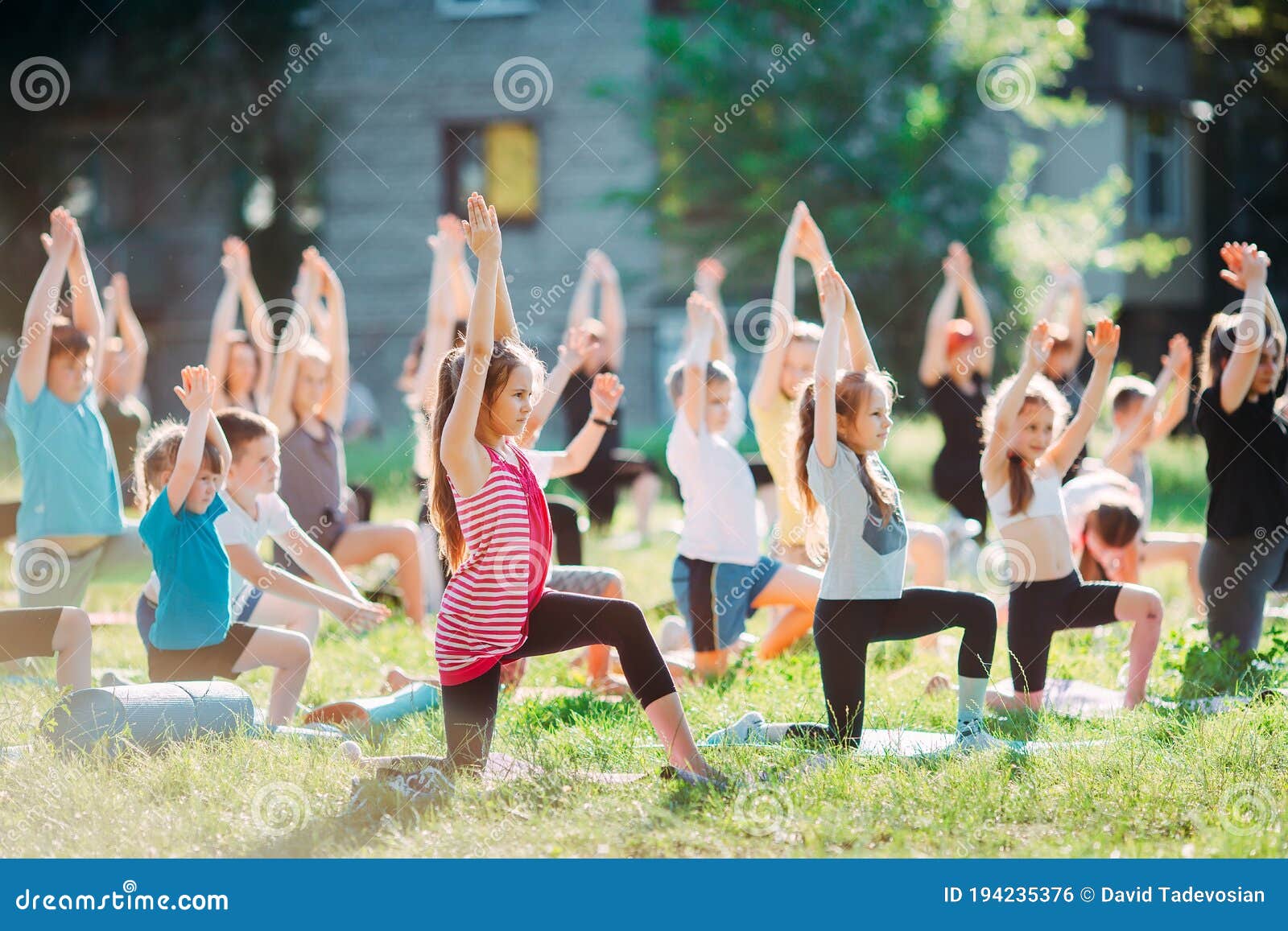Yoga Classes Outside on the Open Air. Kids Yoga, Stock Photo - Image of ...