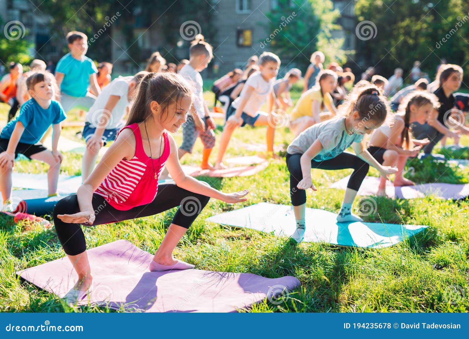 Yoga Classes Outside on the Open Air. Kids Yoga, Stock Photo - Image of ...