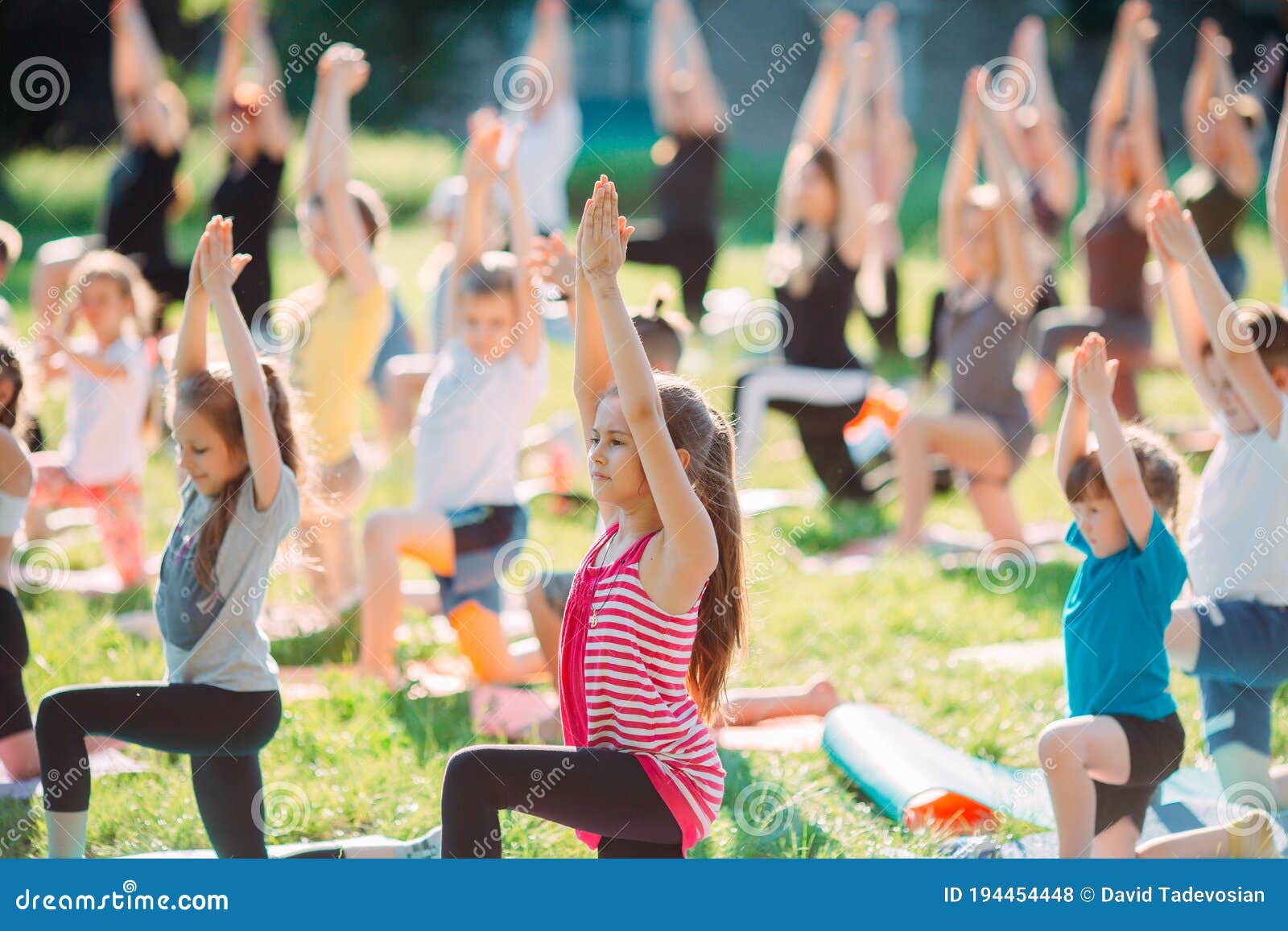 Yoga Classes Outside on the Open Air. Kids Yoga, Stock Photo - Image of ...