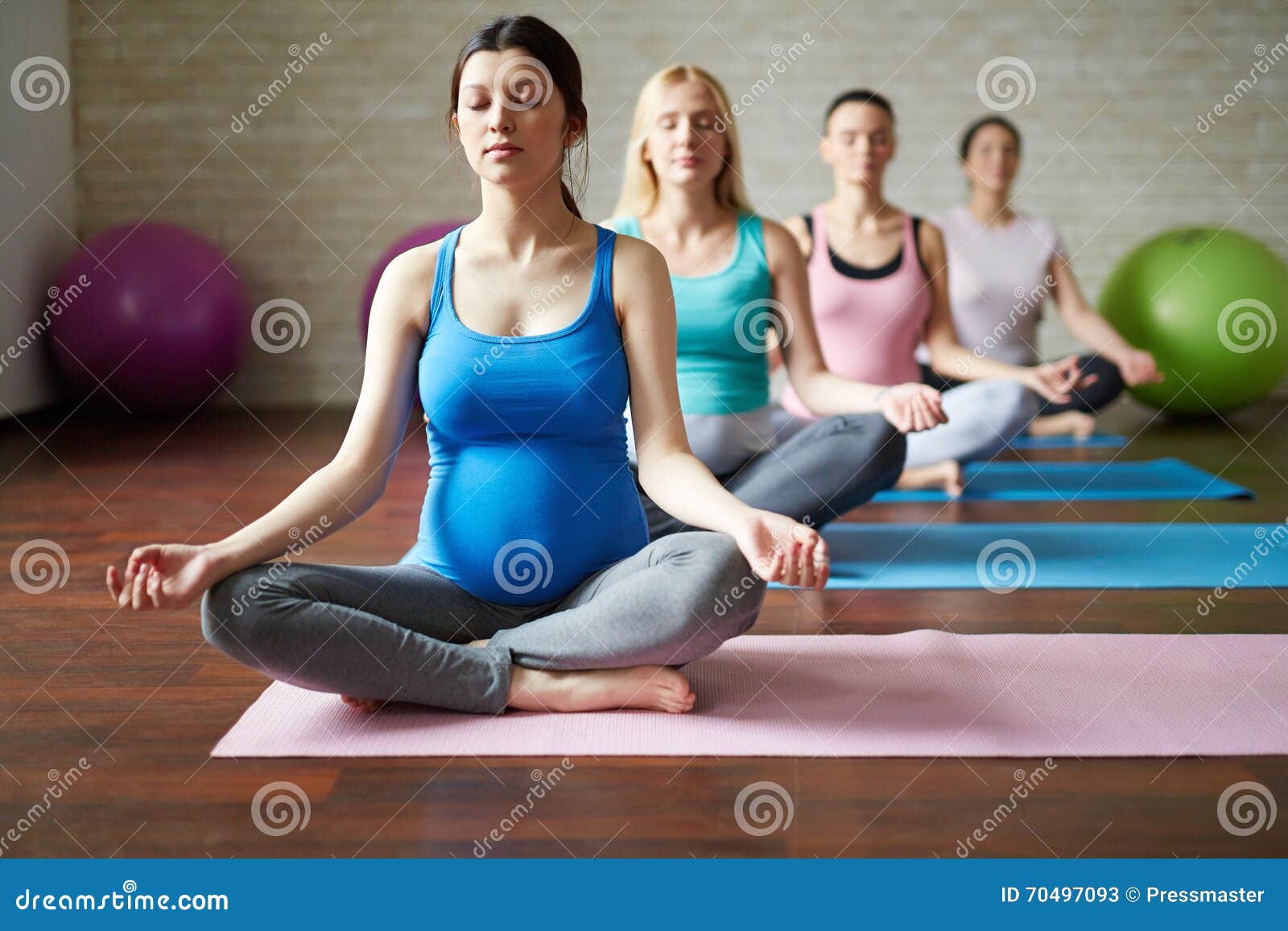 Yoga for future mothers stock image. Image of balance - 70497093