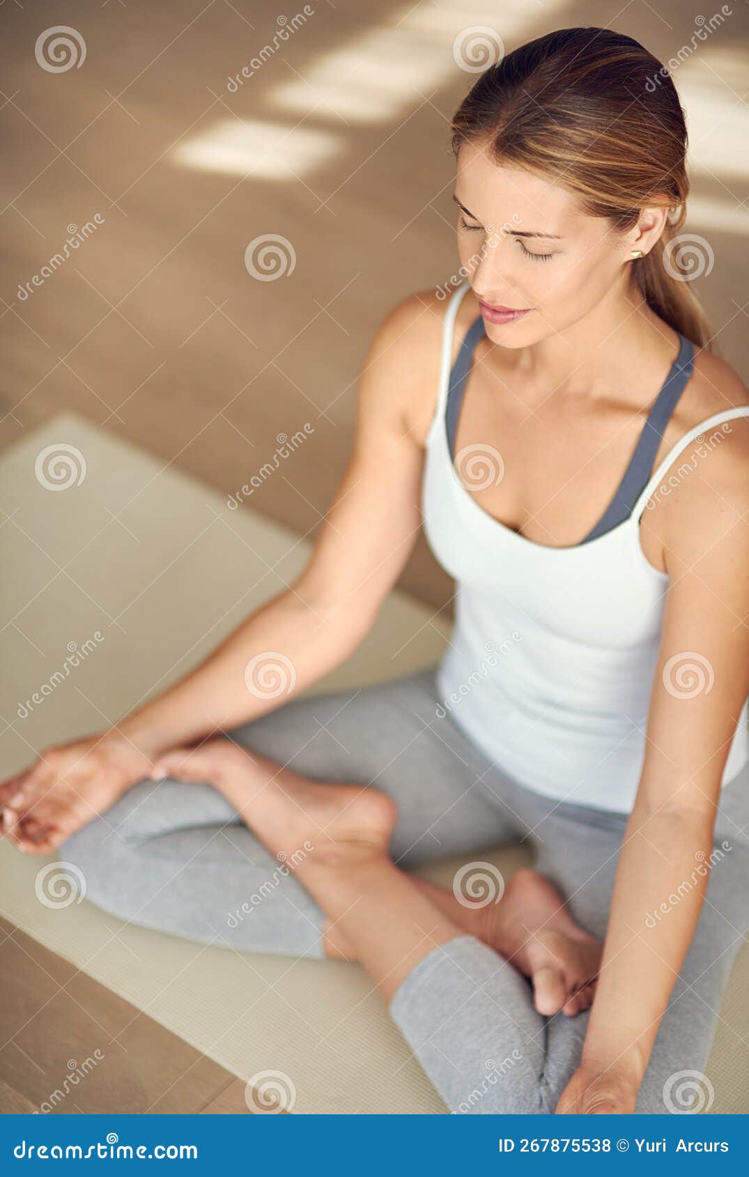Yoga Increases Mental Concentration. a Young Woman Practicing Yoga ...
