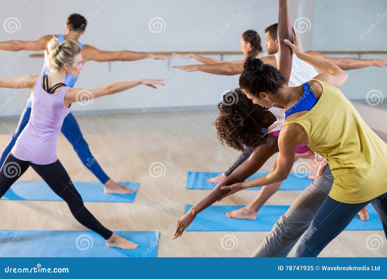 Yoga Instructor Helping Student with a Correct Pose Stock Image - Image ...