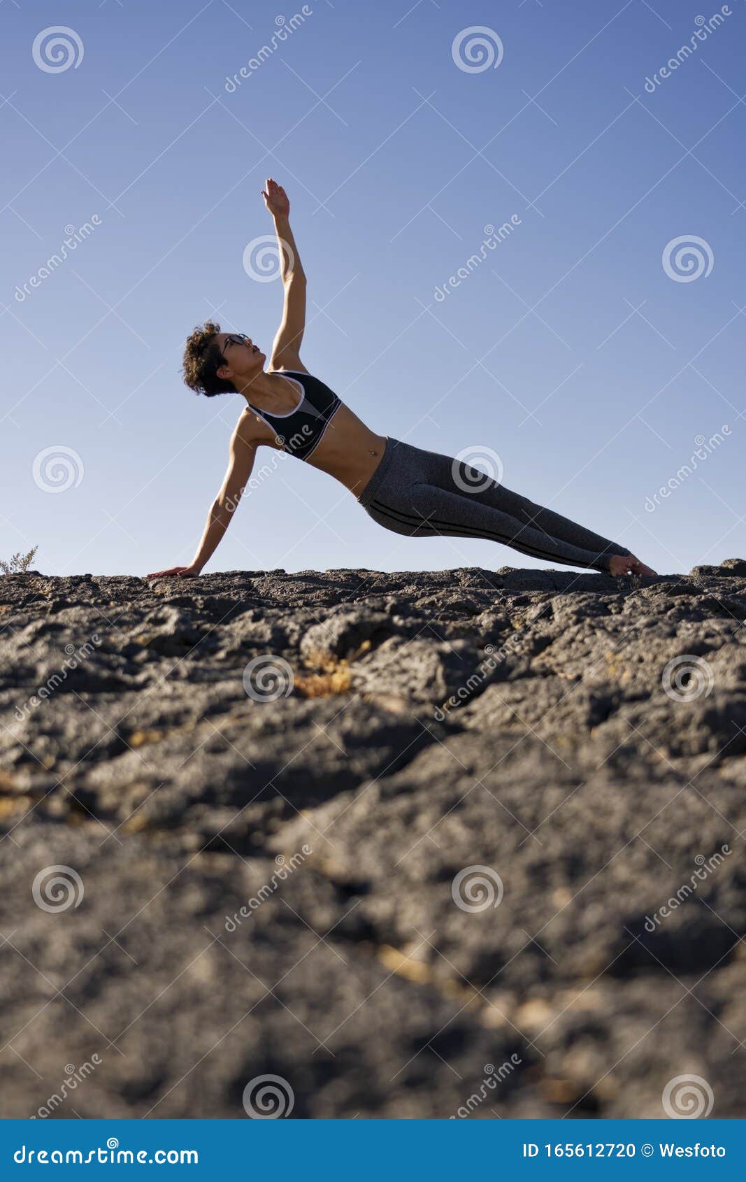 Yoga on Lava Rocks stock photo. Image of health, balance - 165612720