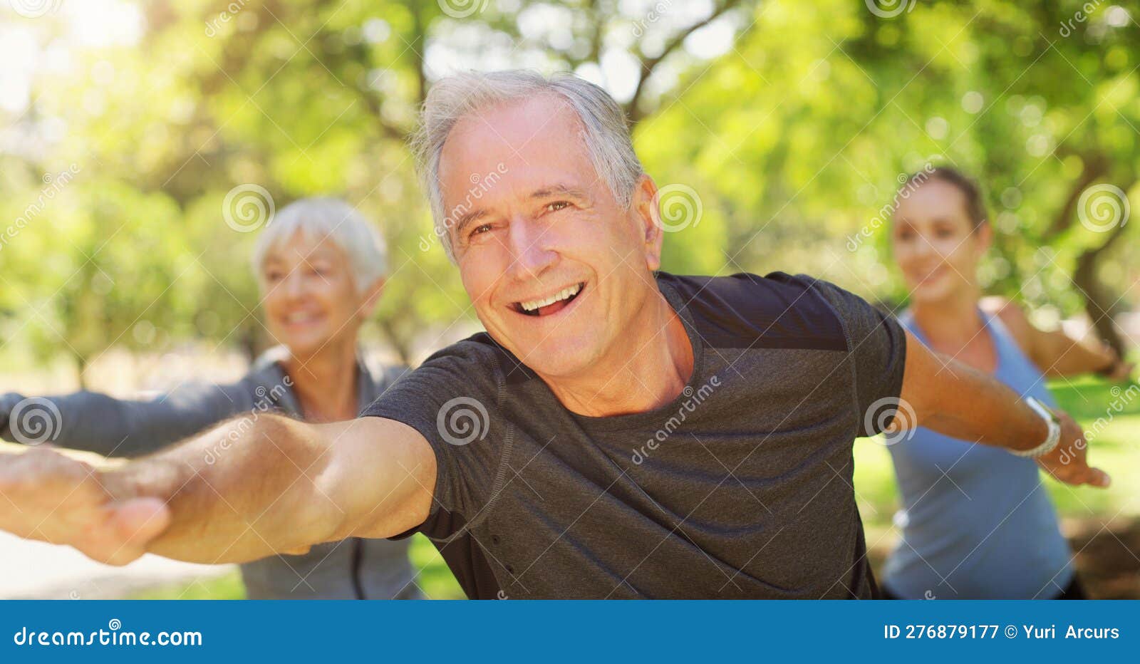 Yoga Makes Everyone Happy. a Group of People Practising Yoga at the ...
