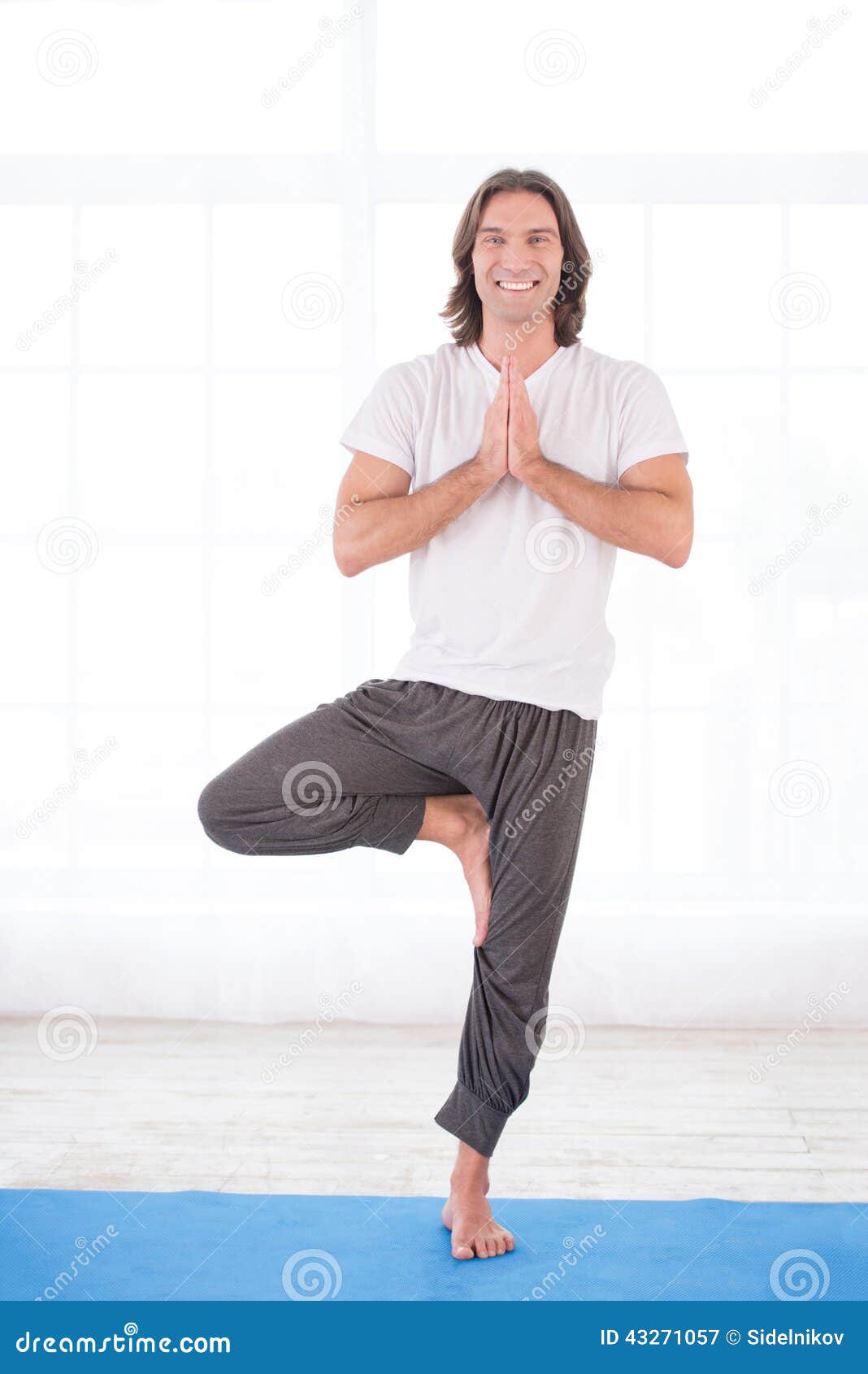 Yoga man doing tree pose stock image. Image of exercise - 43271057