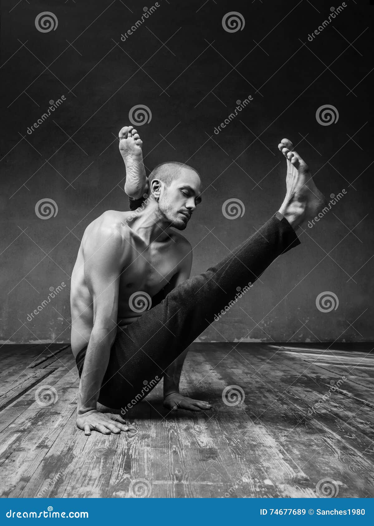 Yoga man posing in studio stock image. Image of mediation - 74677689