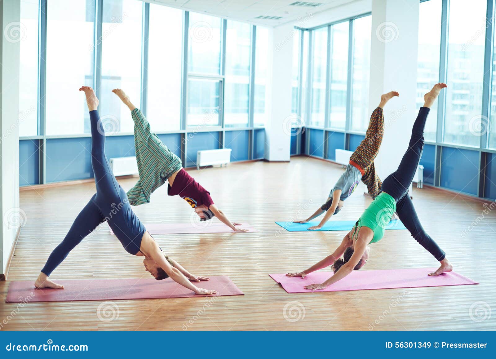 Yoga on mats stock image. Image of sporty, training, portrait - 56301349