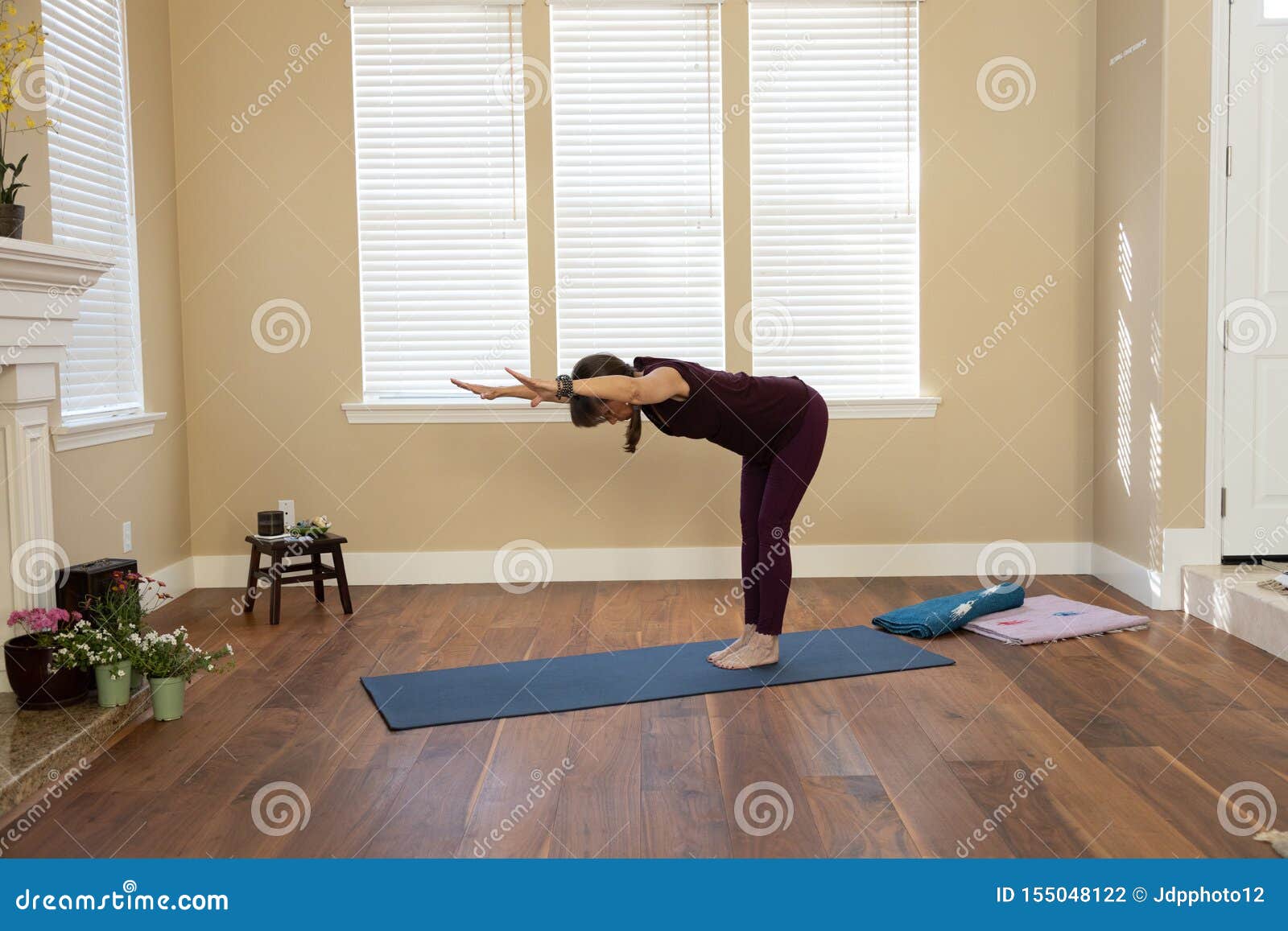 Yoga Pose Half-forward Bend on Mat Indoors Stock Photo - Image of ardha ...