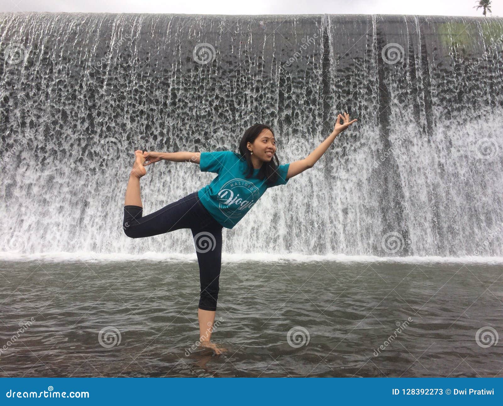 Yoga pose in the river editorial stock photo. Image of hard - 128392273