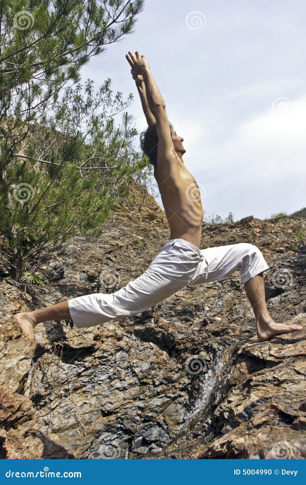 Yoga posture on the rocks stock photo. Image of feeling - 5004990