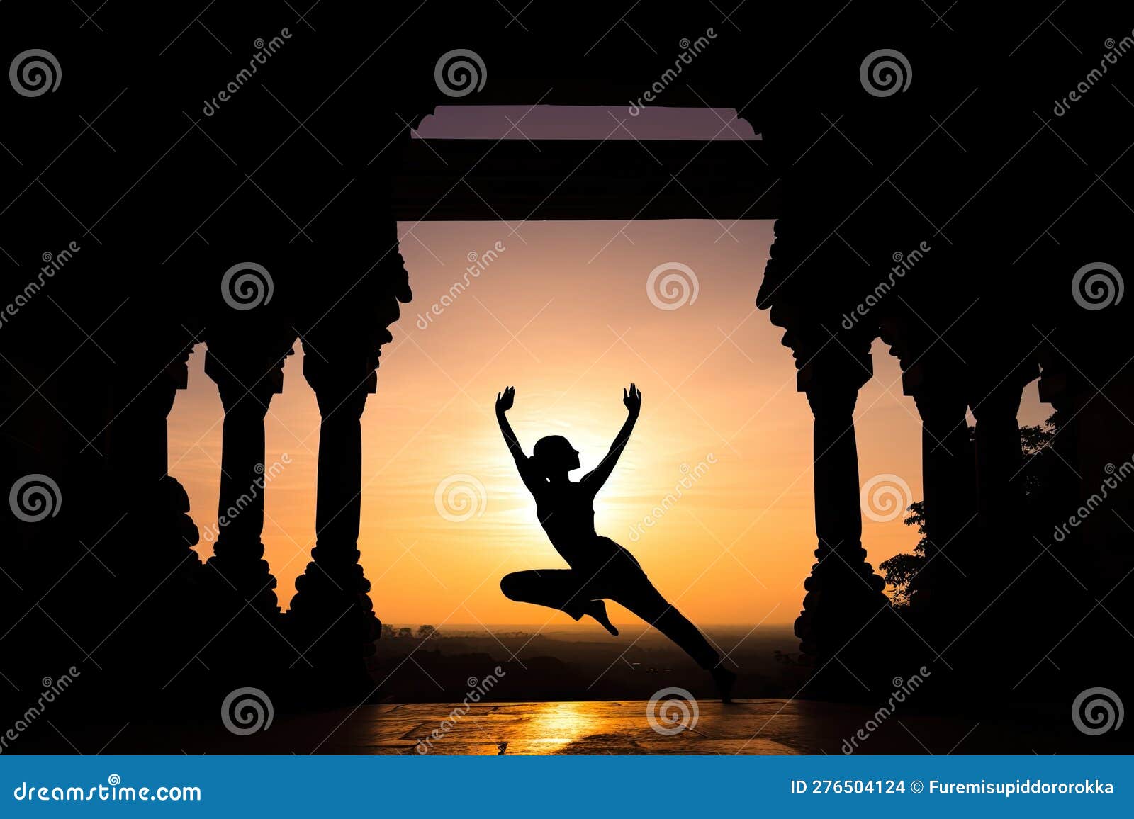 Yoga Silhouette in Temple Yoga Pose Meditates at Sunset with Temple ...