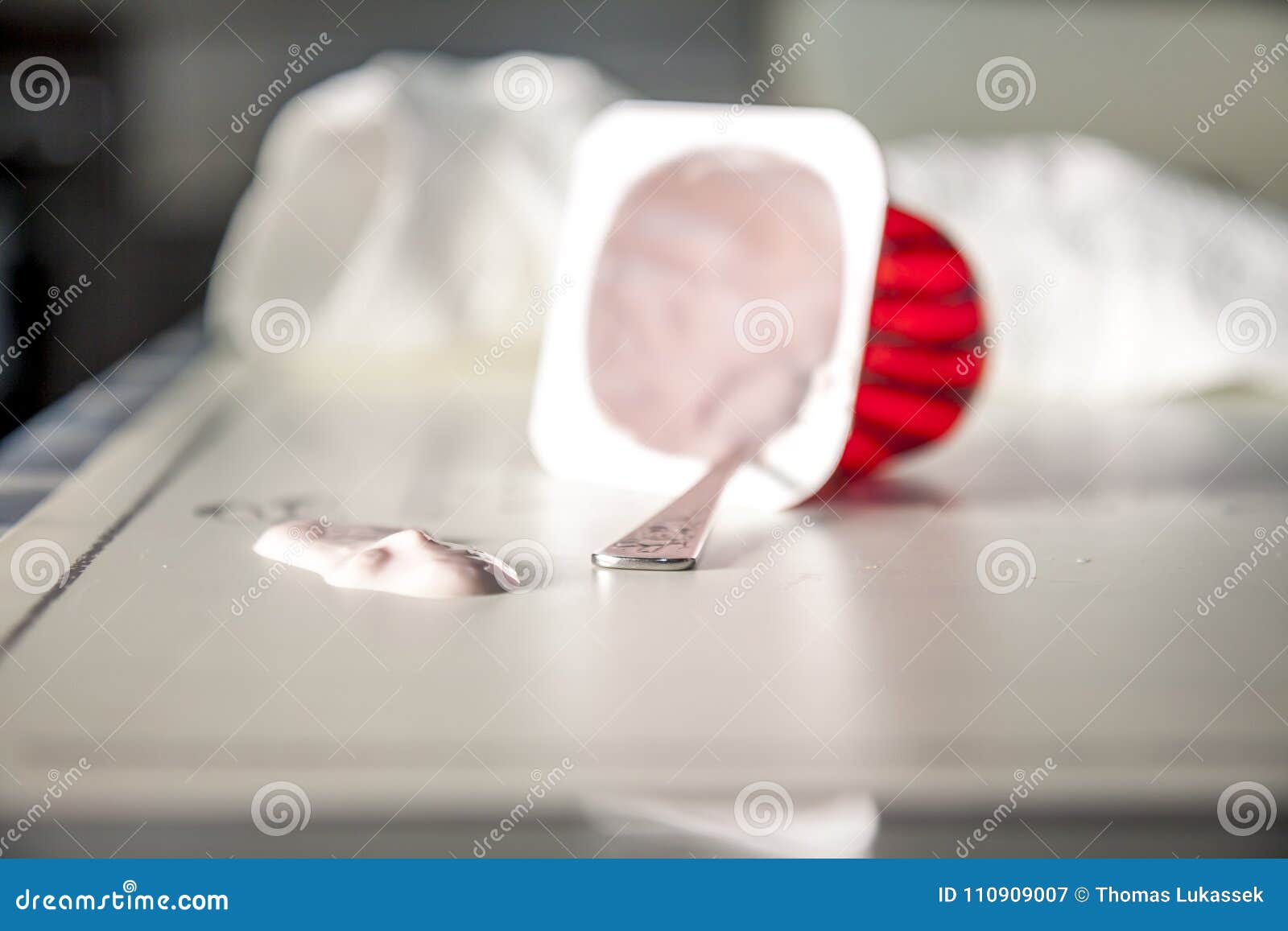 Yoghurt Cup Knocked Over on the Table Stock Image - Image of isolated ...