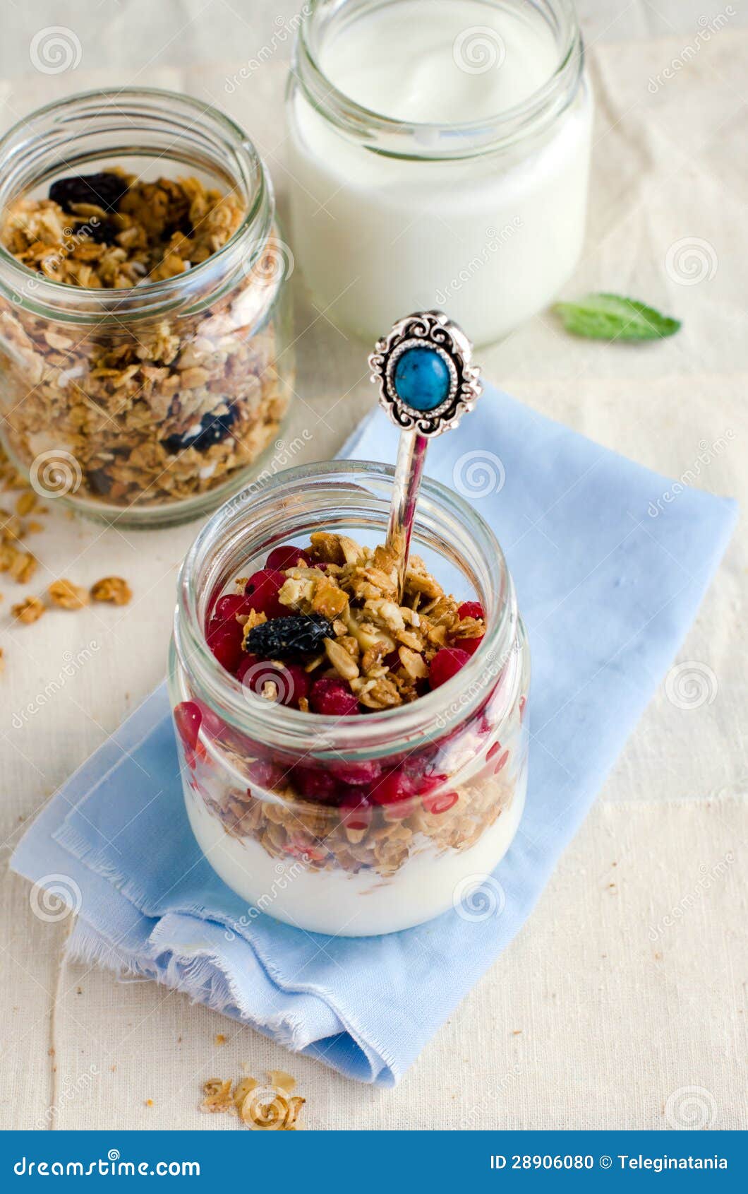 Yoghurt in a Glass Jar with Muesli Stock Photo - Image of raisin ...