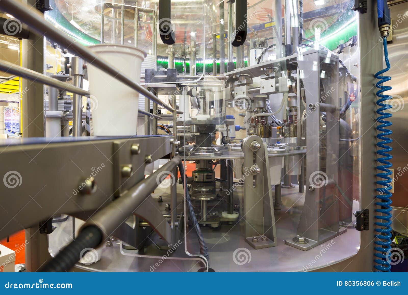 Yoghurt packing machine stock photo. Image of machinery - 80356806