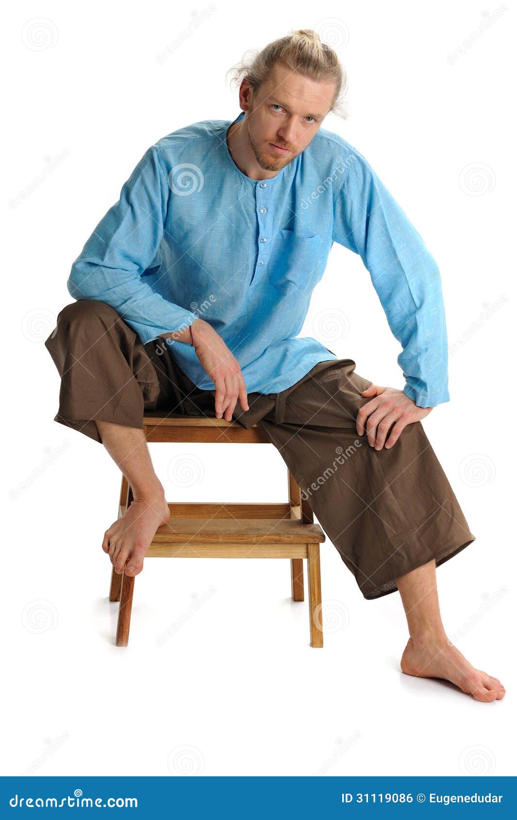 Yogi is sitting on a chair stock photo. Image of sensei - 31119086