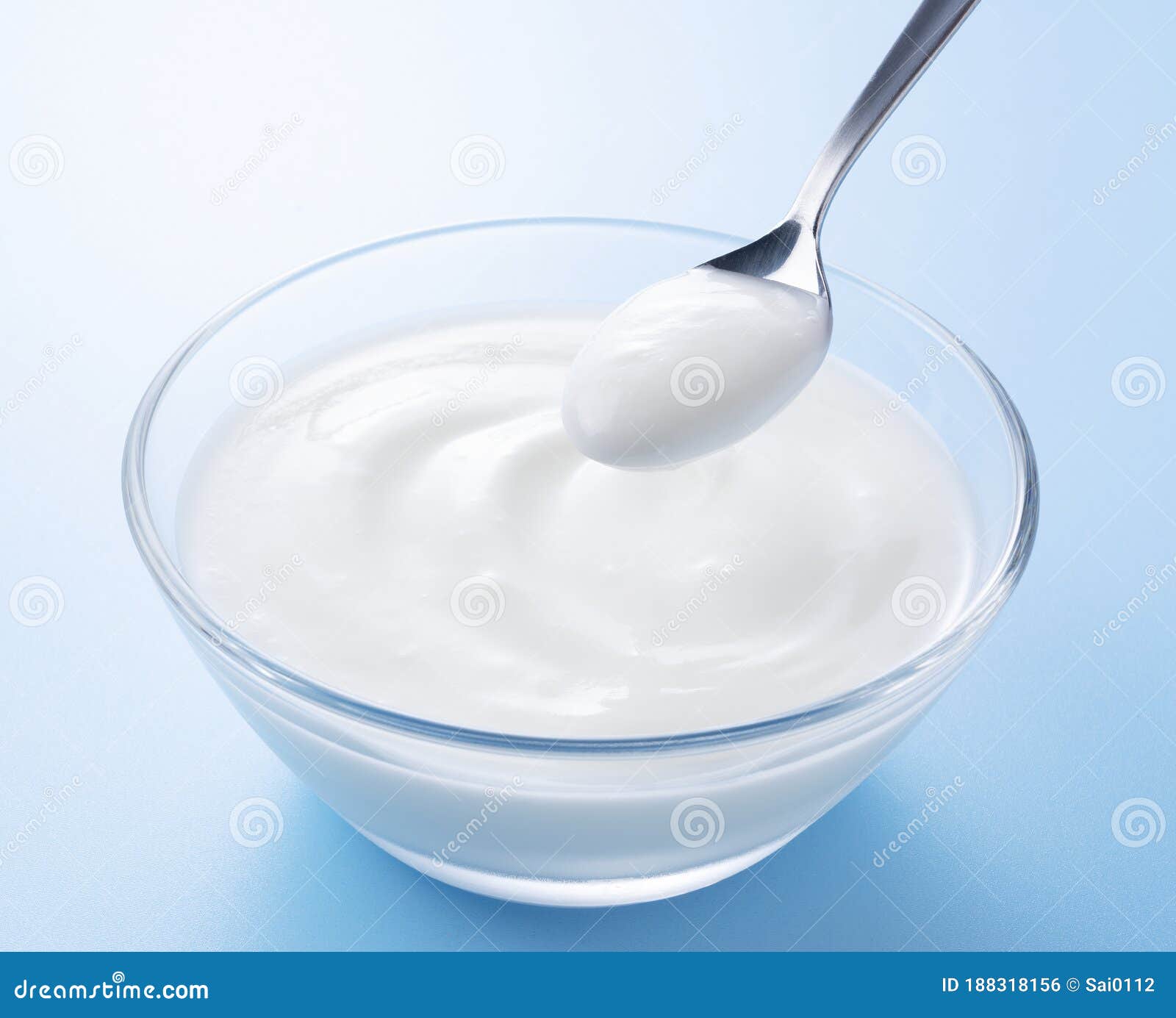 Yogurt on a Blue Background Stock Photo - Image of blue, diet: 188318156