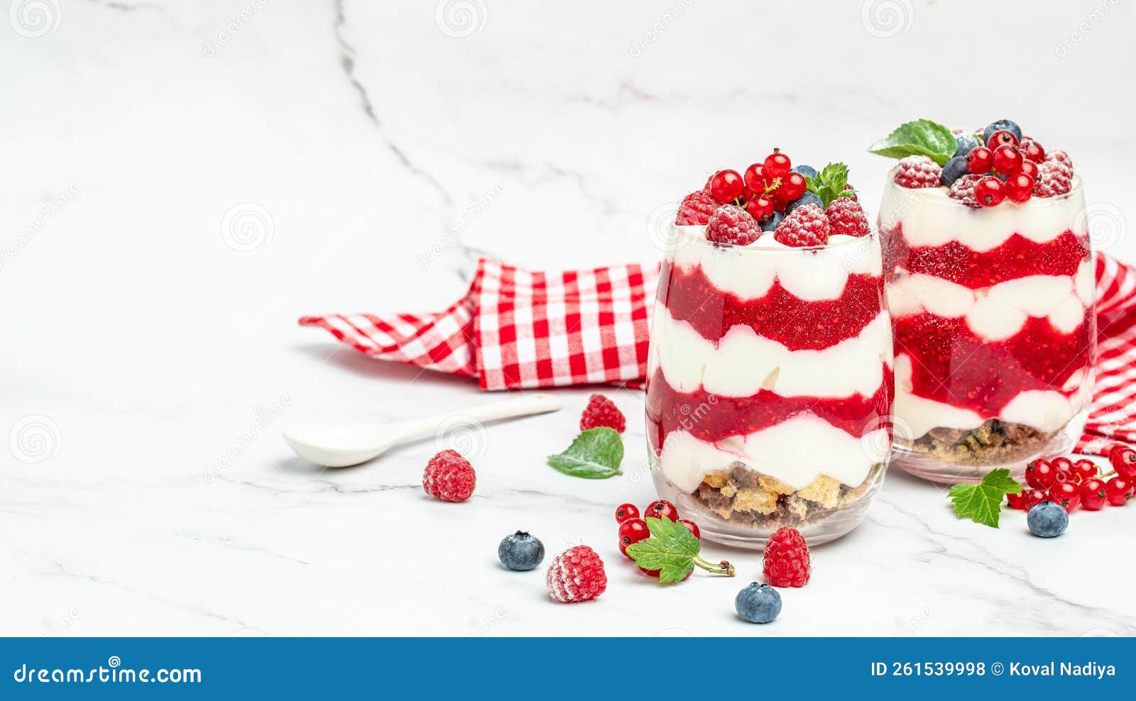 Yogurt Granola Parfait with Blueberry and Raspberry on a Light ...