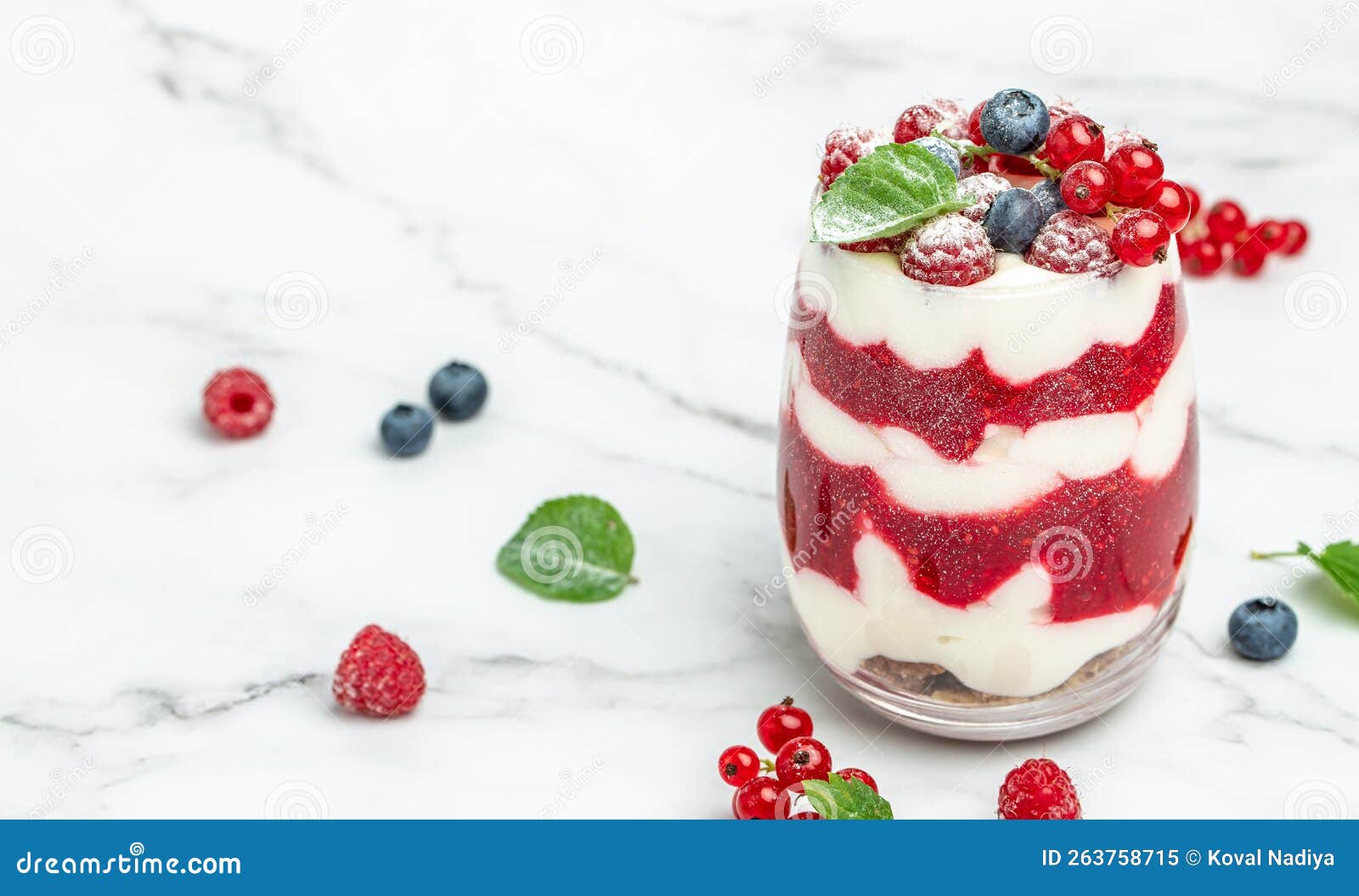 Yogurt Granola Parfait with Blueberry and Raspberry on a Light ...