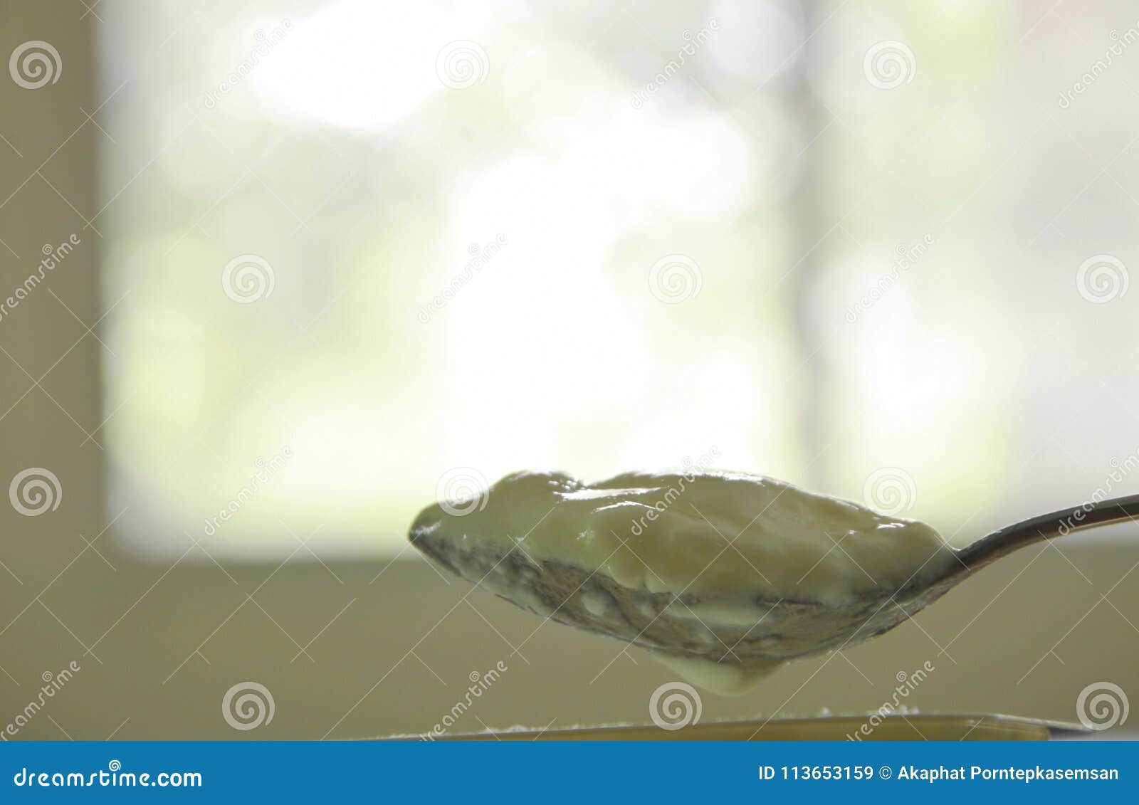 Yogurt Scooping on Spoon from Plastic Cup Stock Image - Image of ...