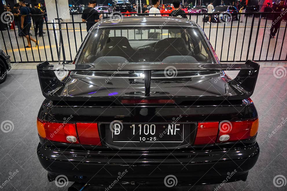Black Mitsubishi Lancer Evolution III in Black Auto Battle Yogyakarta ...