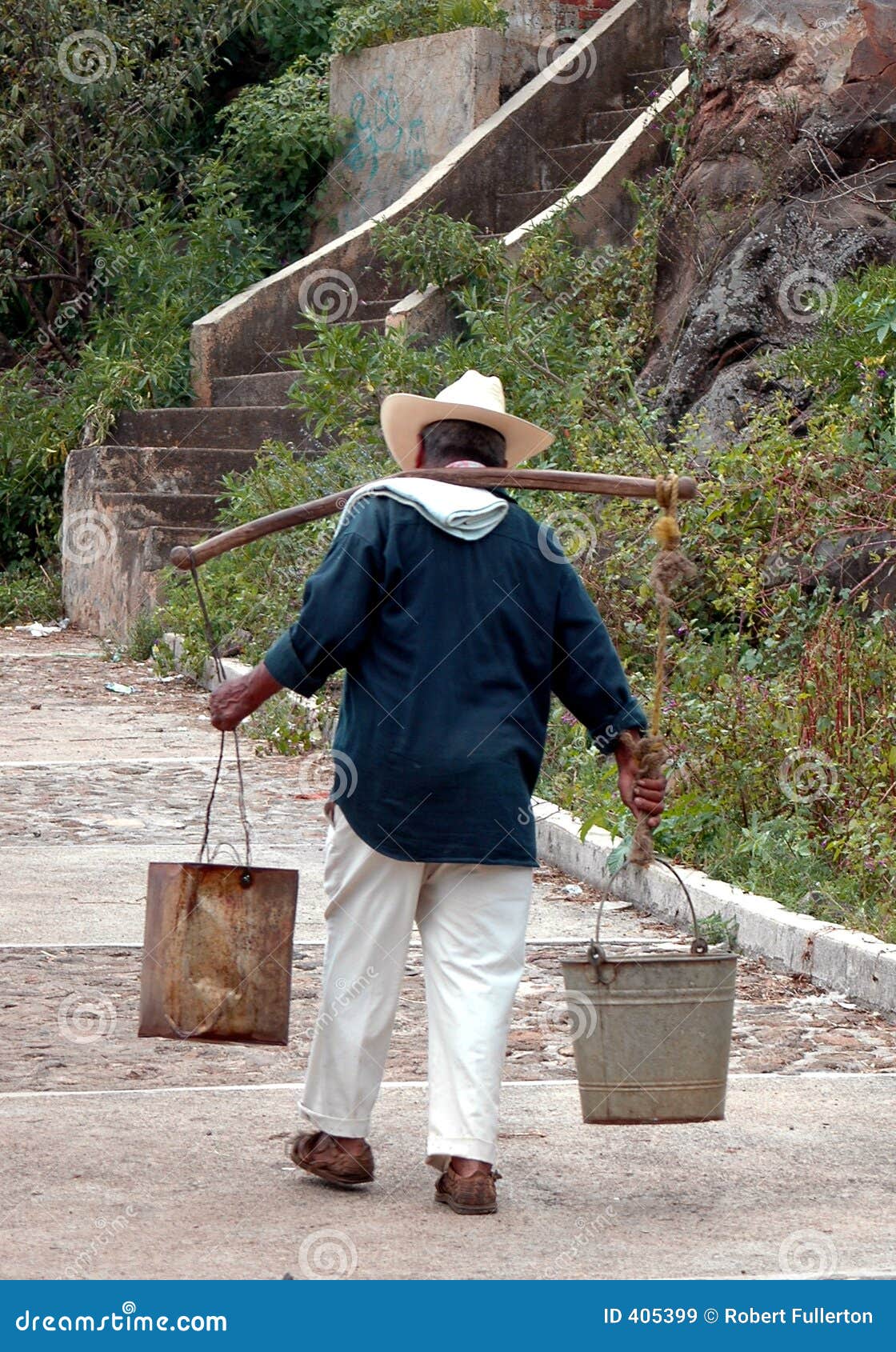Yoking buckets of water stock image. Image of huraches - 405399