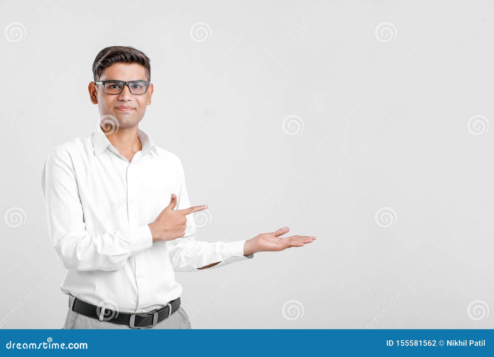 Yong Indian Man Showing Direction with Hand Stock Photo - Image of ...